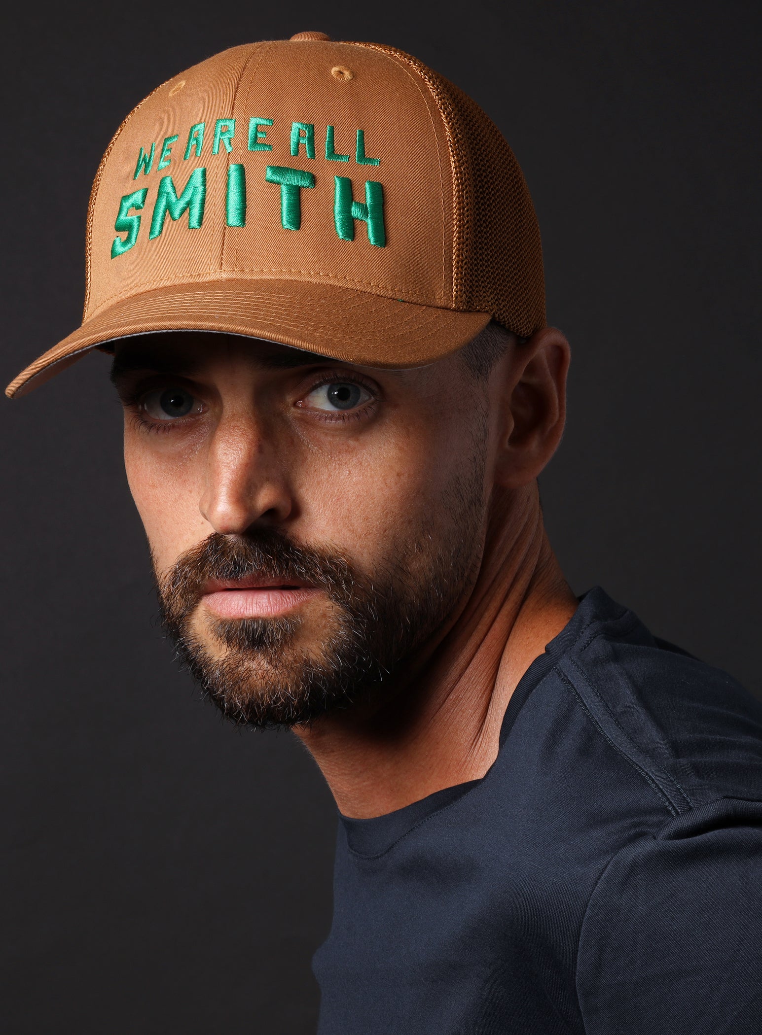 We Are All Smith Caramel + Green Mesh back trucker cap — WE ARE ALL SMITH