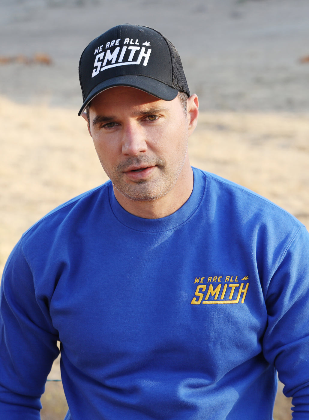 Closed-back black We Are All Smith trucker cap — WE ARE ALL SMITH