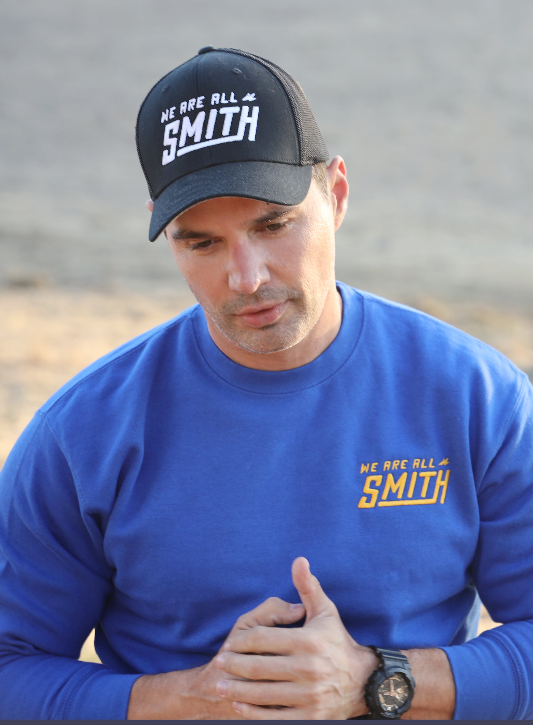Closed-back black We Are All Smith trucker cap — WE ARE ALL SMITH